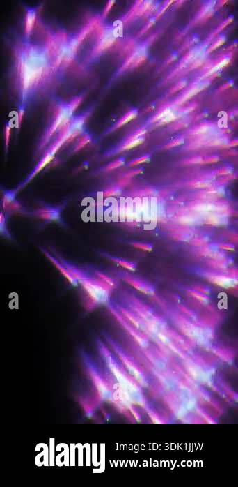 Dynamic purple and pink light effects radiate across a dark space ...