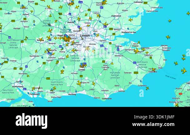 Air traffic map over London metropolitan area showing multiple aircraft ...