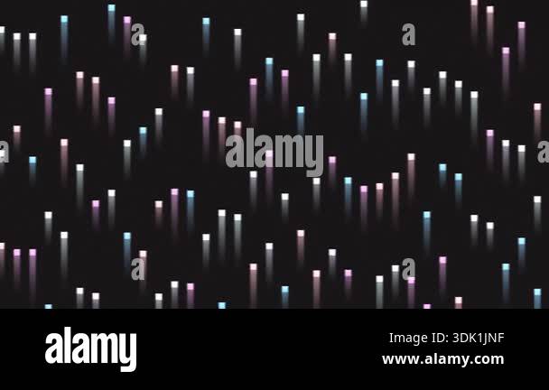 Abstract moving lights form numerous vertical streaks across a dark ...