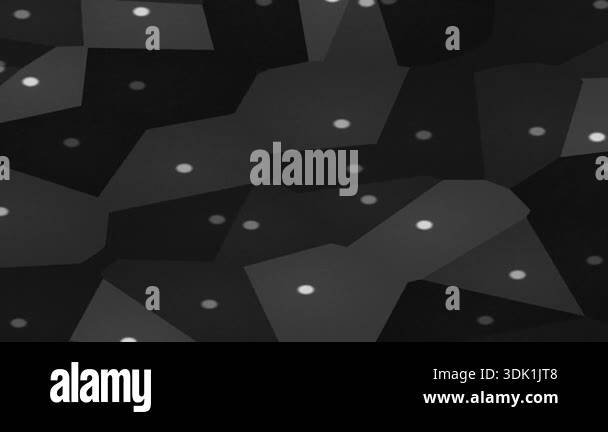 Looping abstract sequence of dark polygonal shapes creating a moody ...