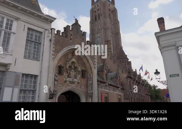 Gothic entrance and towering Church of Our Lady dominate the historic ...