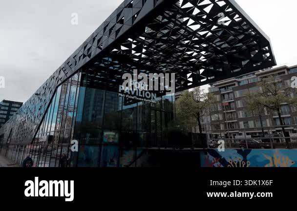 ROTTERDAM, NETHERLANDS - SEPTEMBER 13, 2025 - Contemporary glass and ...