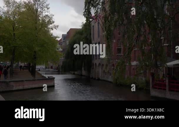 BRUGES, BELGIUM - SEPTEMBER 15, 2025 - Scenic canal in Bruges with ...