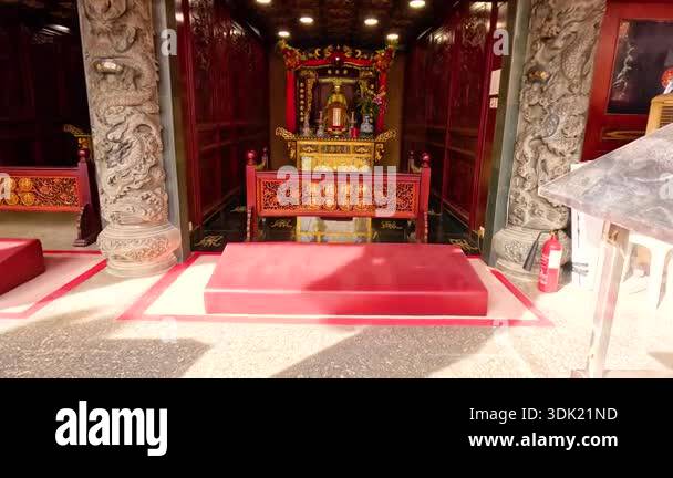 Vibrant temple interior with red lanterns Stock Video Footage - Alamy