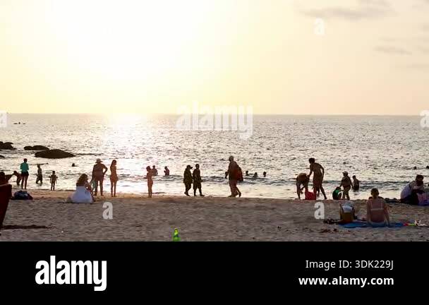 People enjoying sunset at Karon Beach, Phuket Stock Video Footage - Alamy