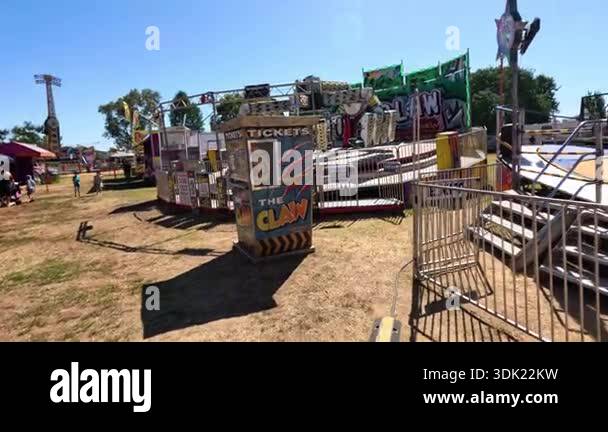Colorful amusement ride at a theme park Stock Video Footage - Alamy