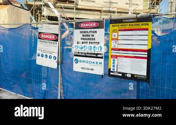 A series of safety signs at a construction site in Surfers Paradise ...
