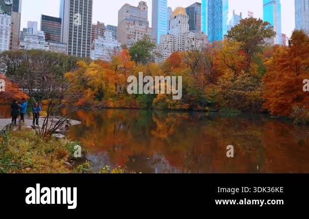 New York, USA, 1 November 2025: People viewing the Central Park lake ...