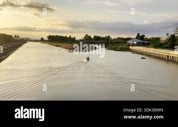 Boat on River at Sunset Stock Video Footage - Alamy
