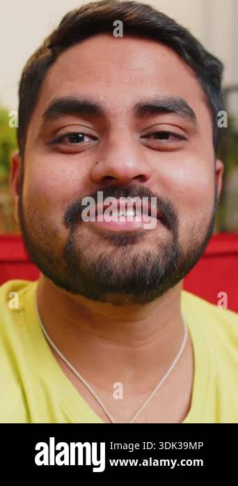 POV view of Indian young man blogger taking selfie on smartphone ...