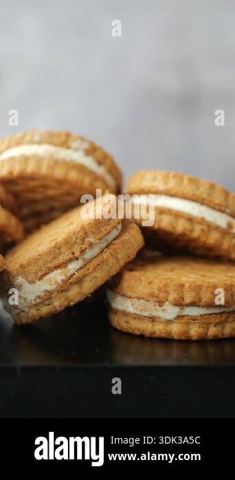 closeup of cream cookies on a plate Stock Video Footage - Alamy