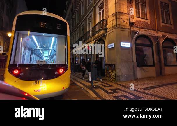 POV car travel through Lisbon streets at night during holidays Stock ...