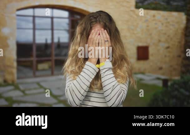 Woman covers hands before peeking Stock Videos & Footage - HD and 4K ...