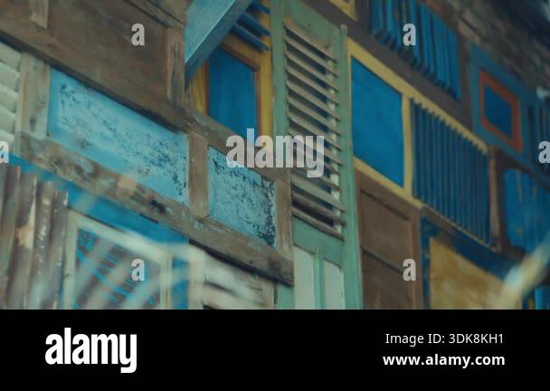 A detailed static shot of a decorative wall made from vintage window ...