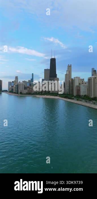 Vertical aerial view of Chicago skyline along Lake Michigan shoreline ...