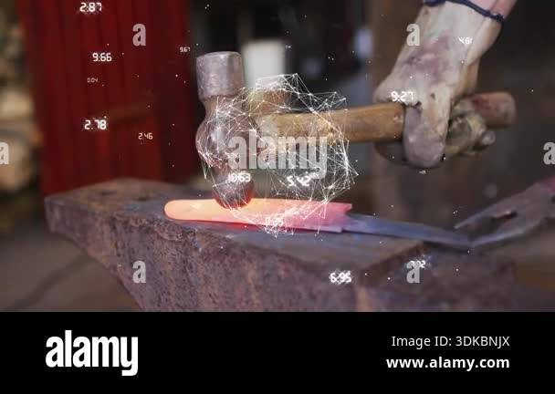 Blacksmith hammering billet on anvil following digital mesh forming ...