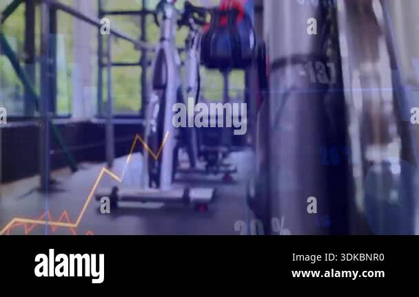 Stepping onto bike, woman biking in gym with animated line graphs, bar ...