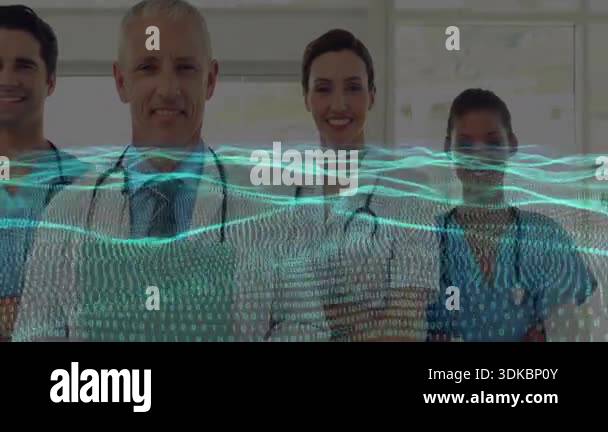 Medical team standing in hospital hall, binary code wave rising over ...