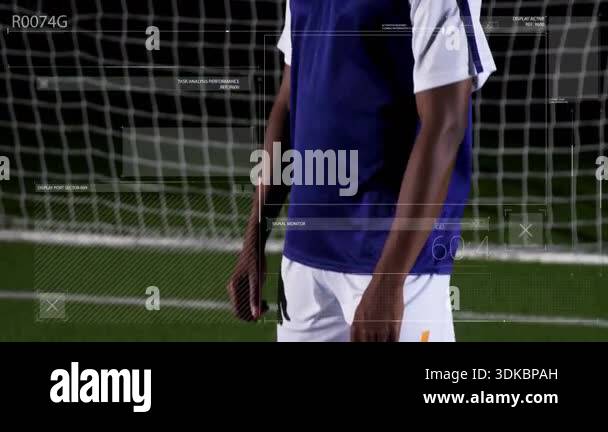 Male soccer player tracking ball approach leaping heading ball to ...