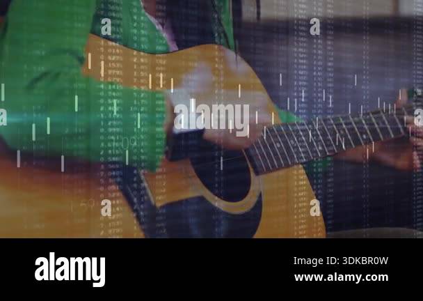 Musician pressing chord and strumming guitar activating tech overlay ...