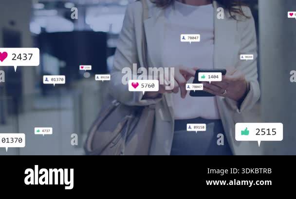 Businesswoman tapping smartphone causing floating icons tracking ...