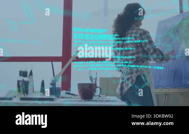 Artist leaning into canvas painting in studio, activating tech code ...