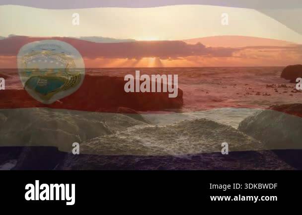 Tricolor flag overlay fading in over rocky coast at dusk, undulating ...
