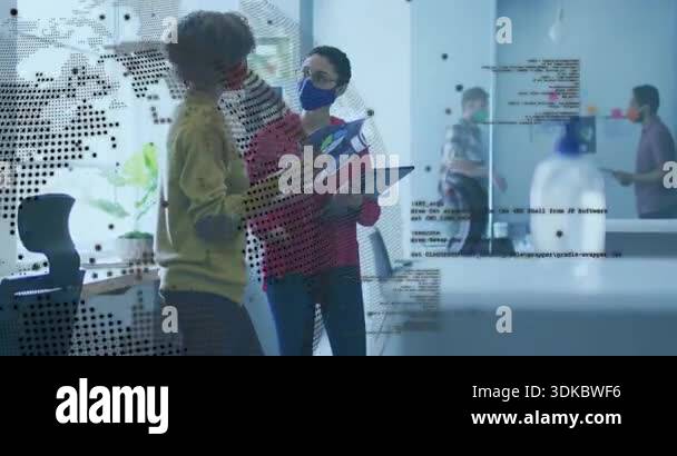 Curly-haired staff referencing laptop and showing chart overlay for ...