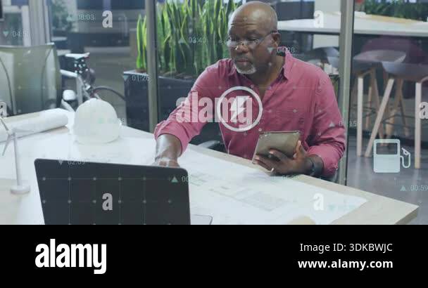Senior engineer tapping tablet and revealing animated service icons ...