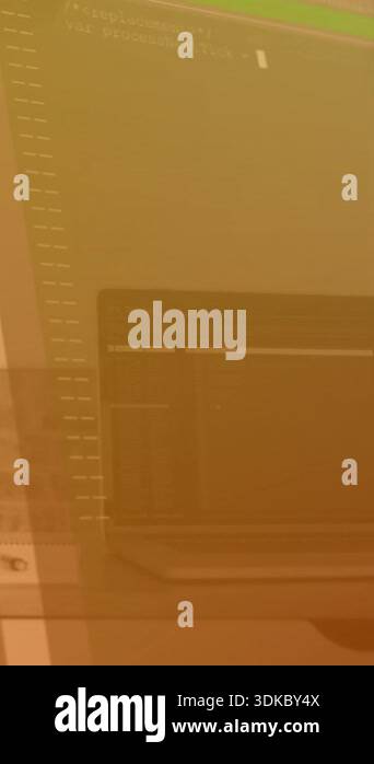 Animation of digital data processing over computer on office desk ...