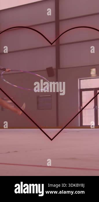 Animation of neon heart over woman exercising with hula hoop ...