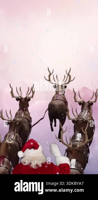 Animation of snow falling over christmas santa claus in sleigh with ...