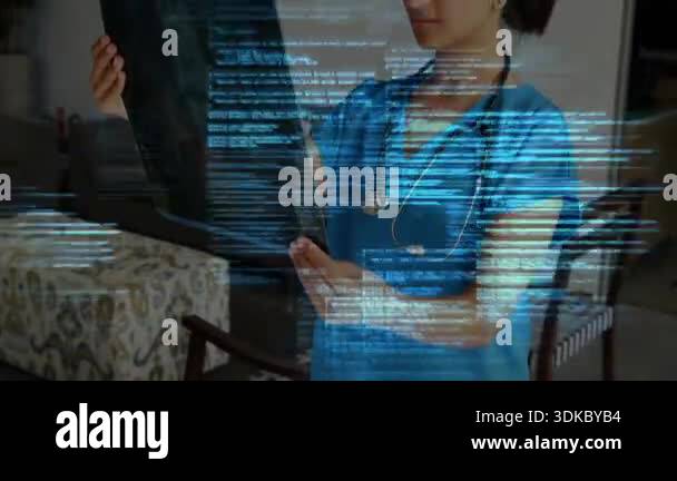 Female doctor gripping and lifting X-ray film causing digital code ...