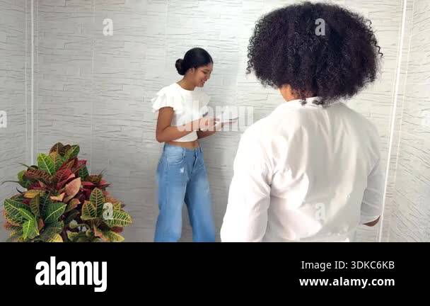 Happy student reading her college admission letter and celebrating with ...