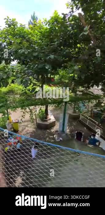 Bandung, Indonesia, January 25, 2026. Vertical aerial video of a POV ...
