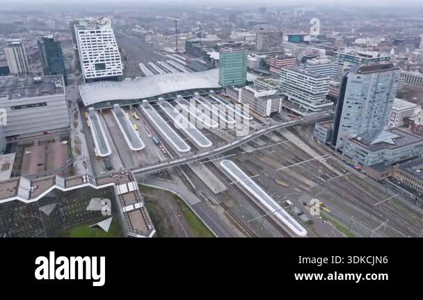 Aerial approach of Utrecht centraal, a modern public transport hub ...
