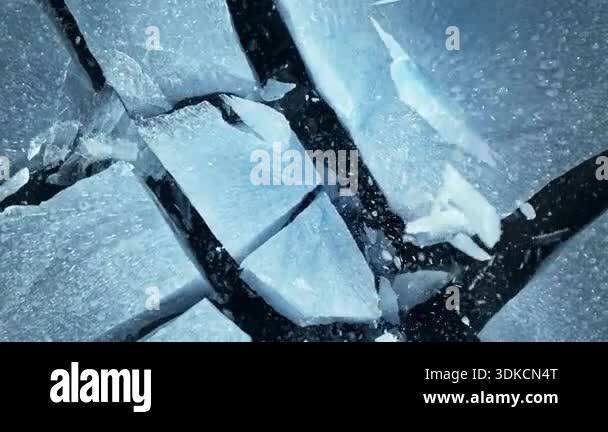 Super Slow Motion Shot of Ice Breaking at 1000 fps. Filmed with High ...