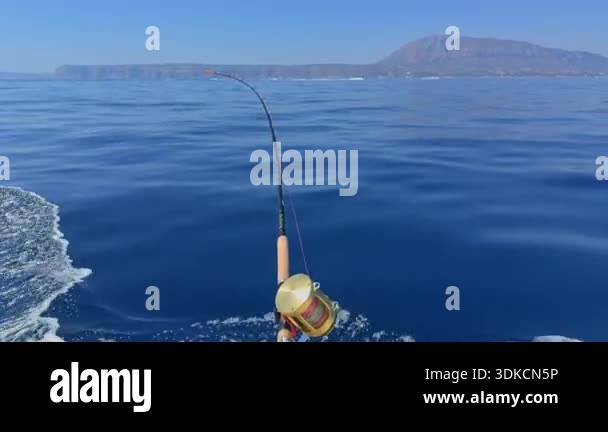 Javea and Denia trolling fishing rods on small boat, Mediterranean Sea ...
