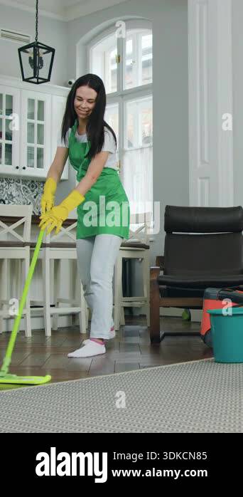 Portrait of adorable happy professional positive female cleaner in ...