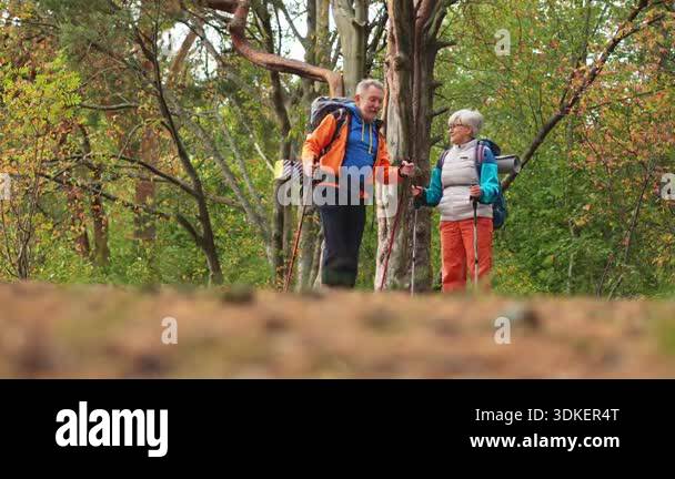 Hiking tourism adventure. Senior couple man woman enjoying outdoor ...