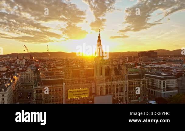 Vienna city hall aerial at sunset. Vienna Rathaus skyline during sunset ...