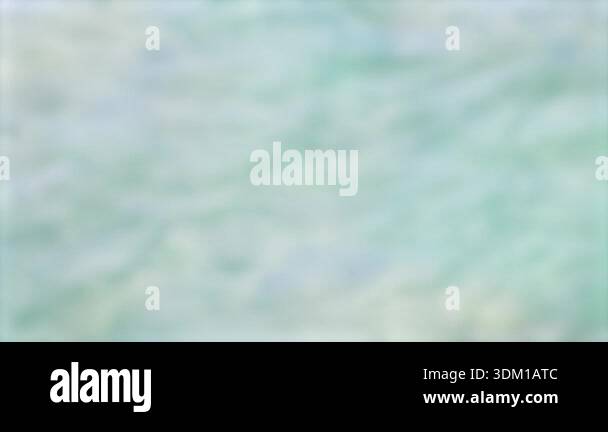 A seamless loop of soft ocean waves creating a calming, textured ...