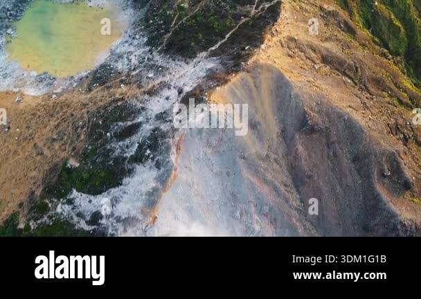 Drone flight along mountain ridge at Mount Sibayak volcano. Crater ...