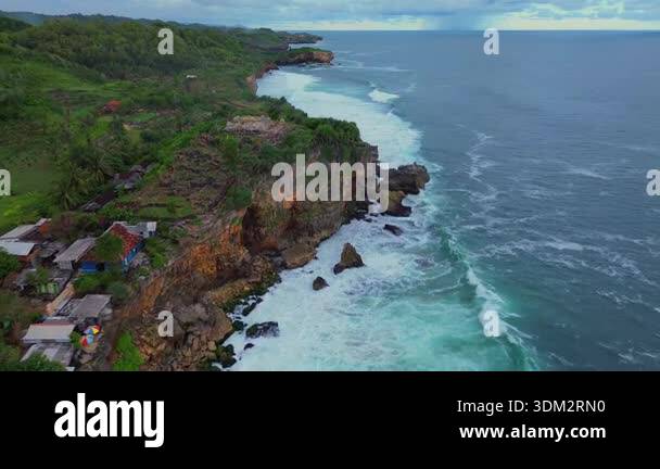 Aerial drone view of Ngobaran Beach, Gunung Kidul, Yogyakarta, a ...