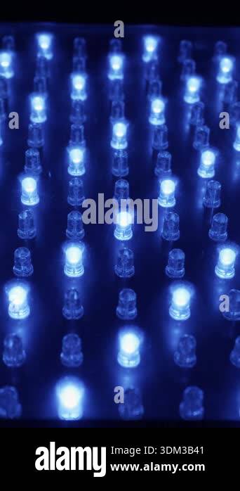 A grid of RGB LED lights flashes and changes colors in a dynamic ...
