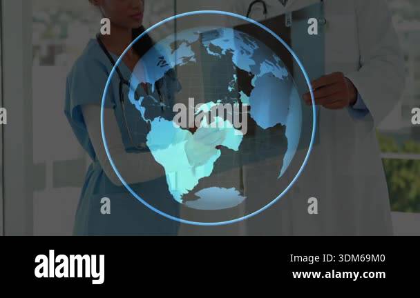 Rotating globe guiding nurse and doctor examining patient chart as ...