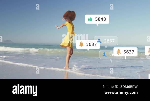 Female influencer stepping into surf, spinning with social icons rising ...