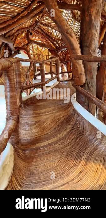 Walk by the wavy hallway with wooden railing. Tour around SFER IK art ...