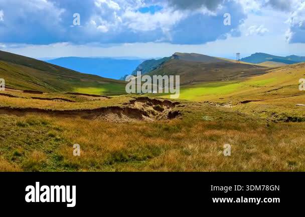 Cloudy skies over distant mountains Stock Videos & Footage - HD and 4K ...