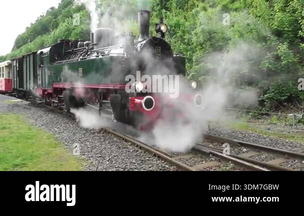 steam train starting a tour Stock Video Footage - Alamy